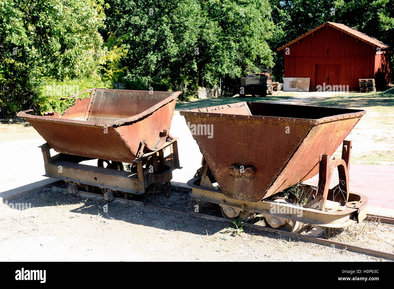 wagons of rusty mines Stock Photo - Alamy