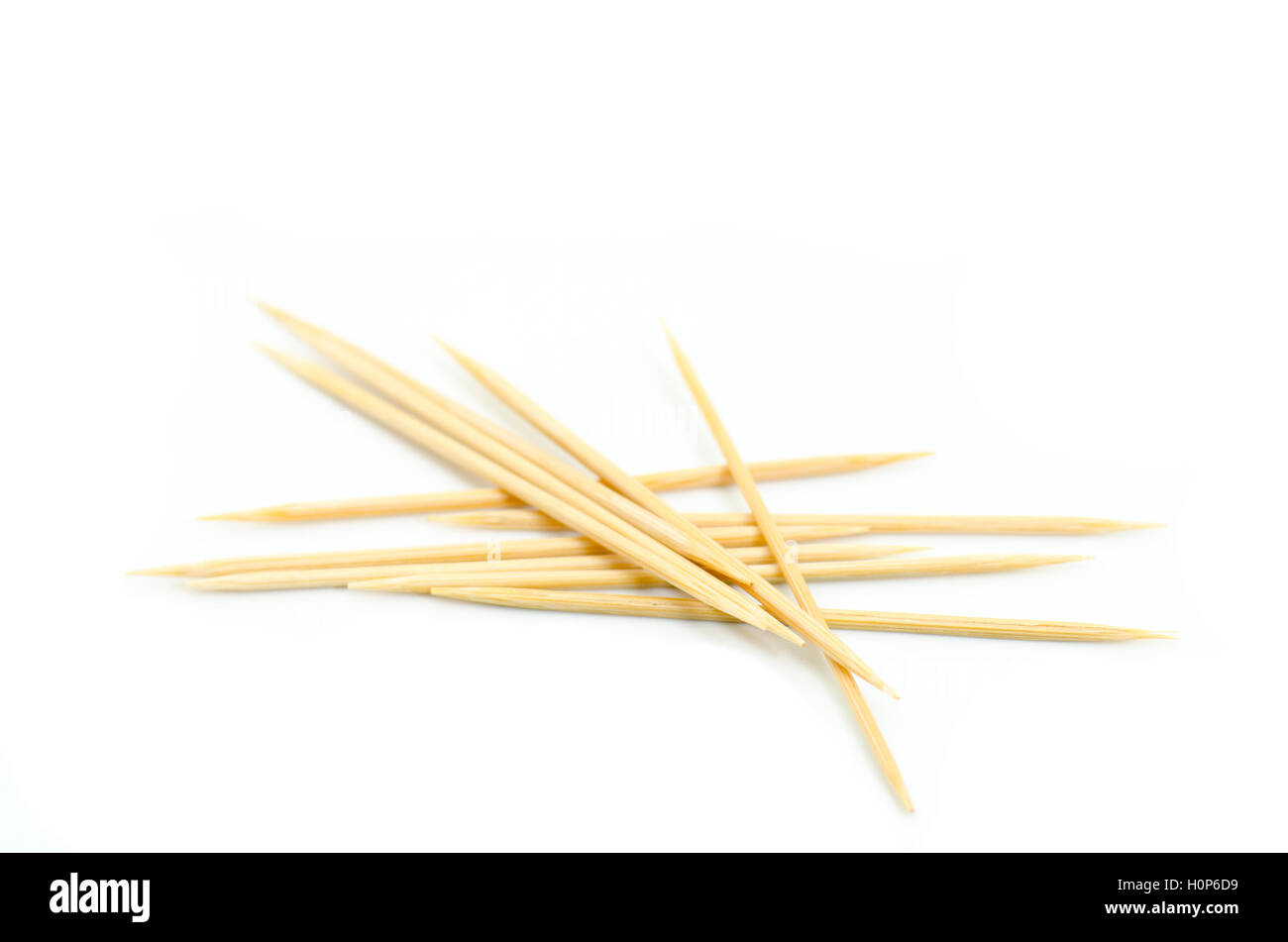 Many wooden toothpicks isolated on white Stock Photo - Alamy