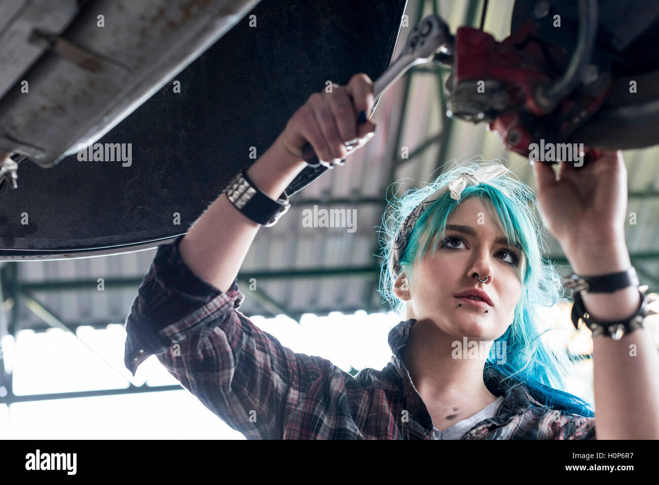 Hydraulic lift car mechanic hi-res stock photography and images - Alamy