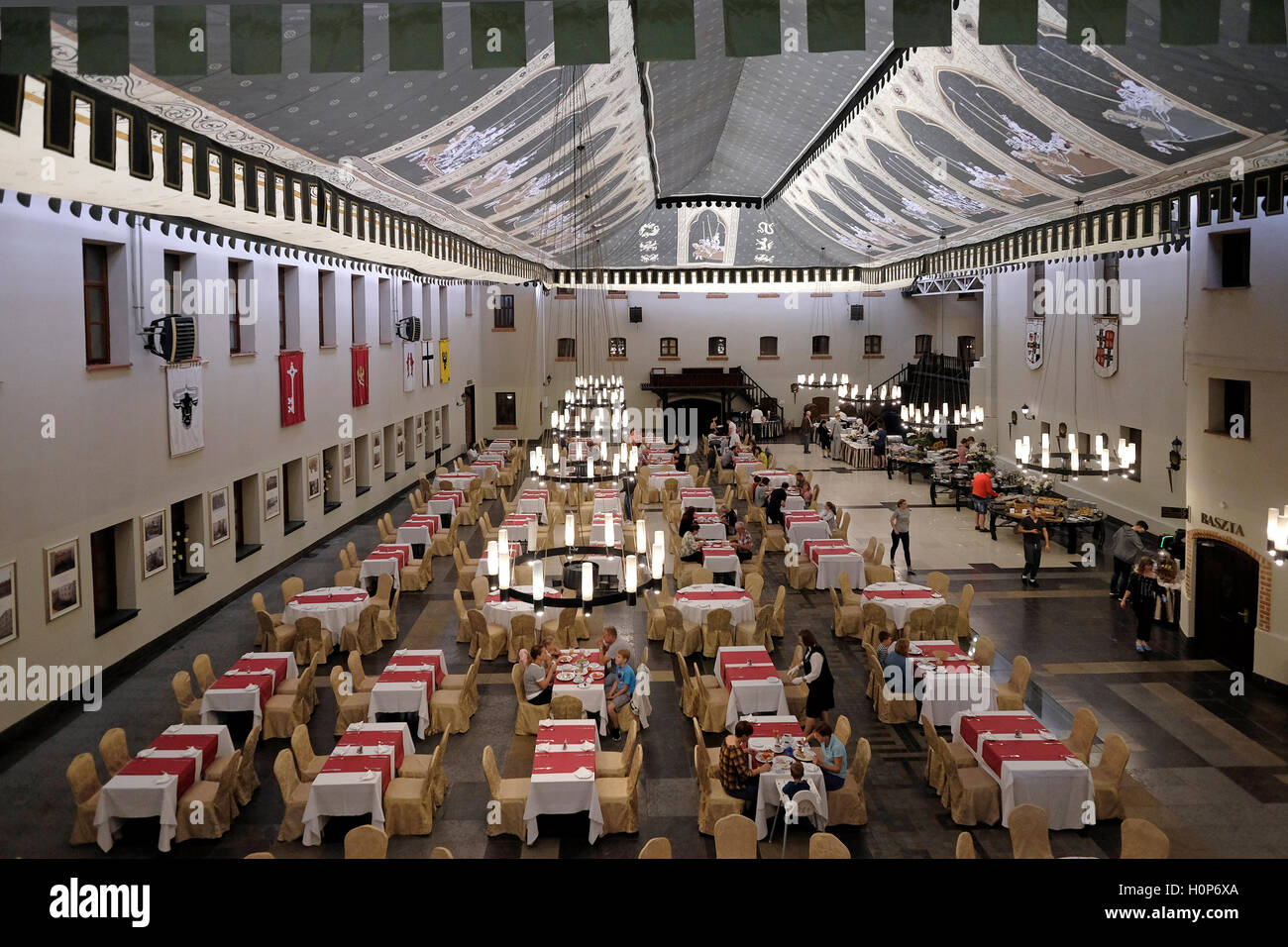 The dining hall at the inner courtyard of Hotel Zamek Ryn Housed in a ...