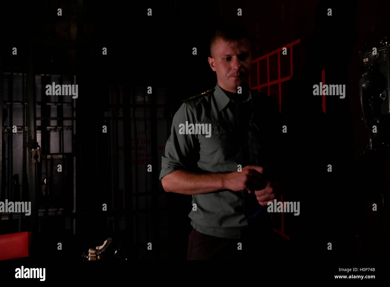 A uniformed Russian guide at the underground tunnel of the Tagansky ...