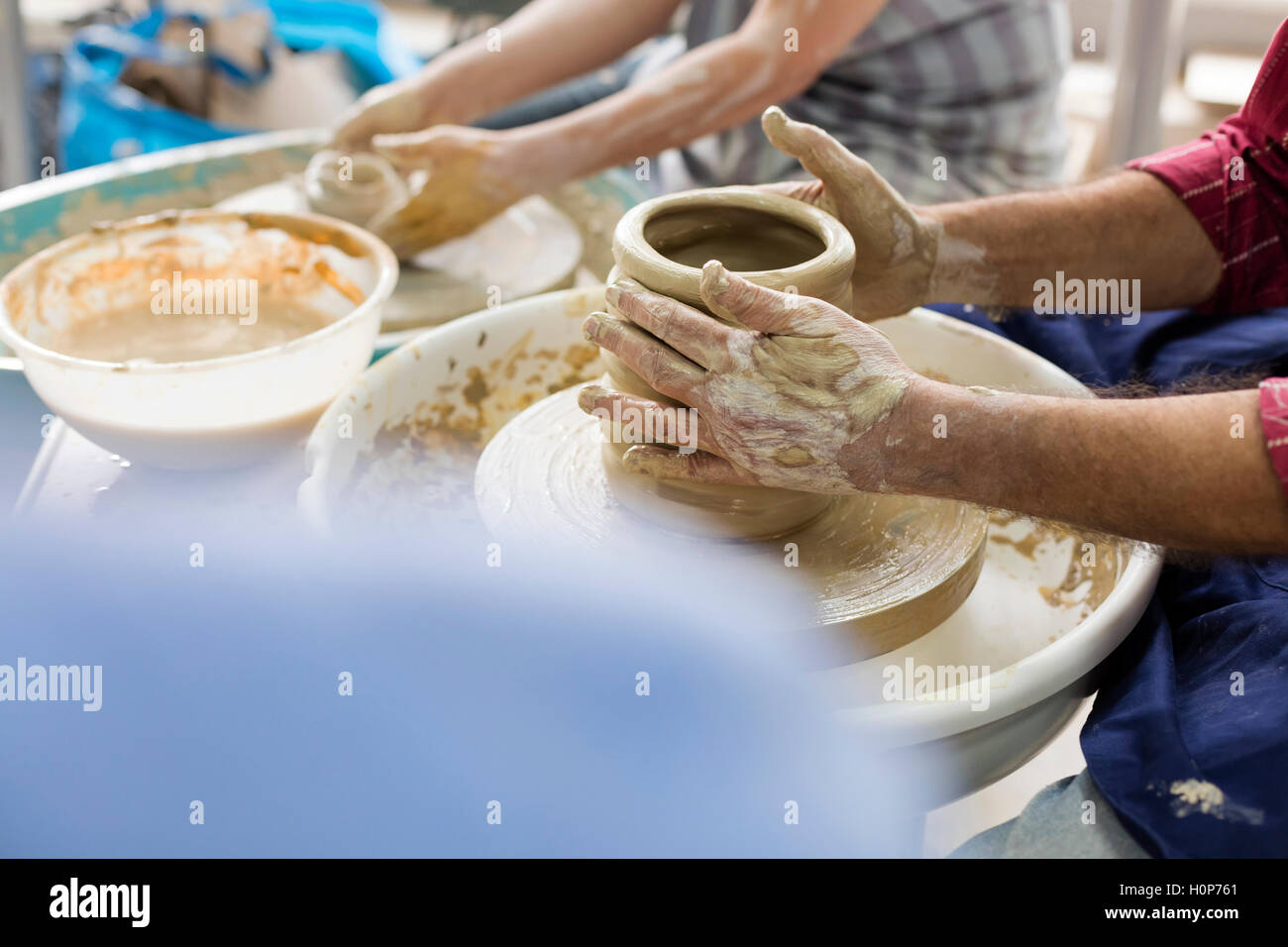senior man using pottery wheel studio Stock Photo - Alamy