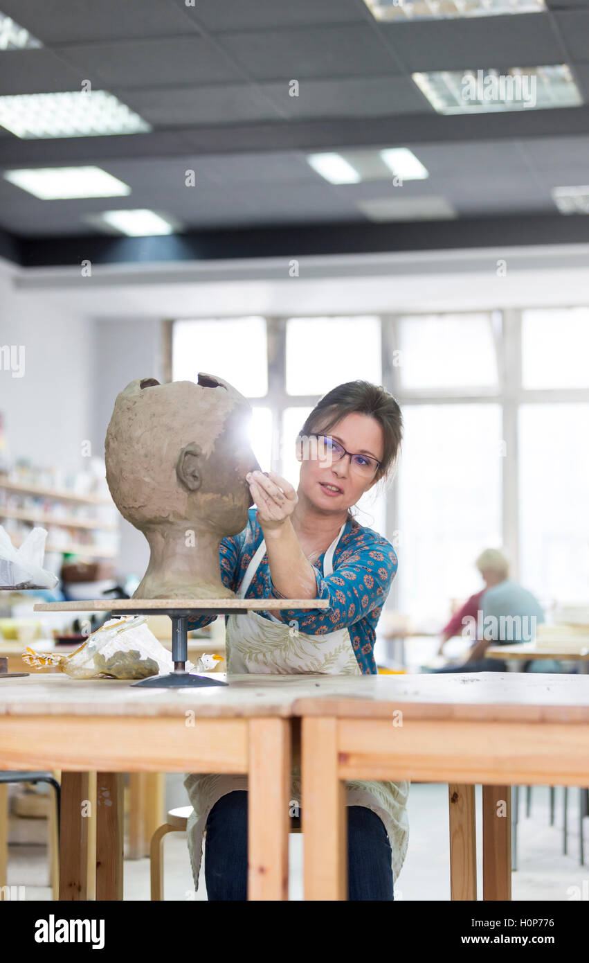 artist sculpting face clay studio Stock Photo - Alamy