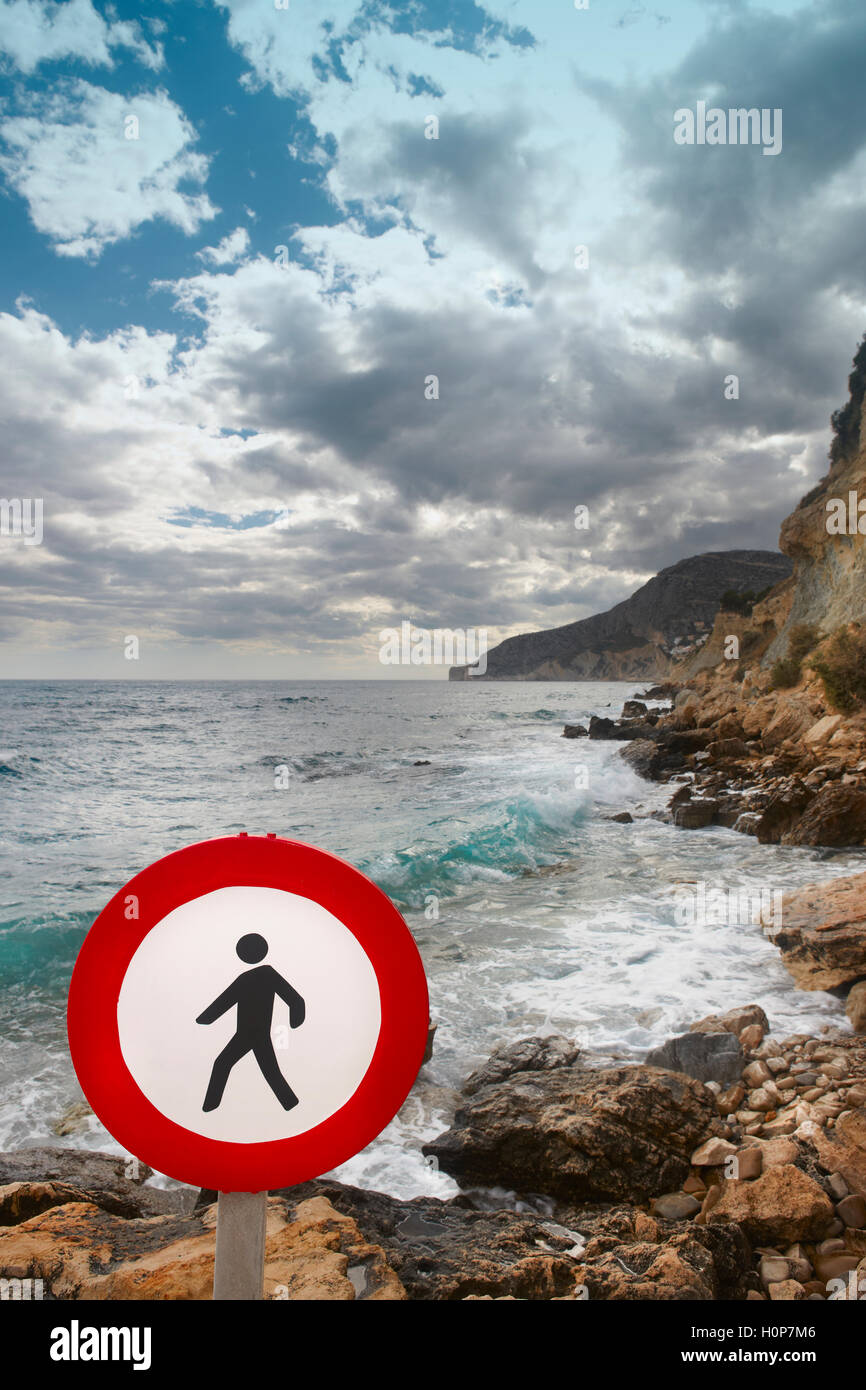 Pedestrian signal in a mediterranean coastline landscape. Alicante ...