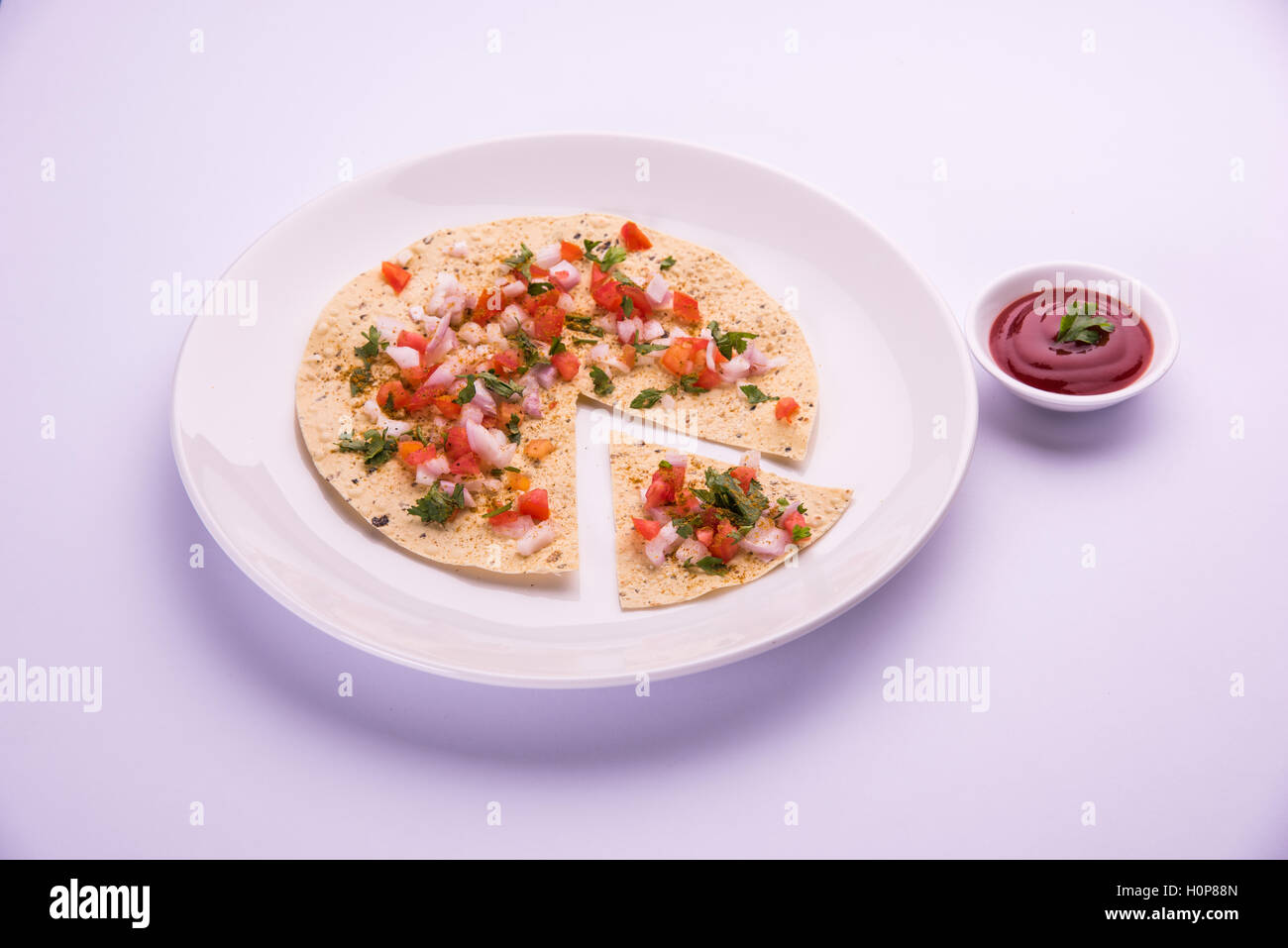 masala papad , indian vegetarian crispy food or starter Stock Photo - Alamy