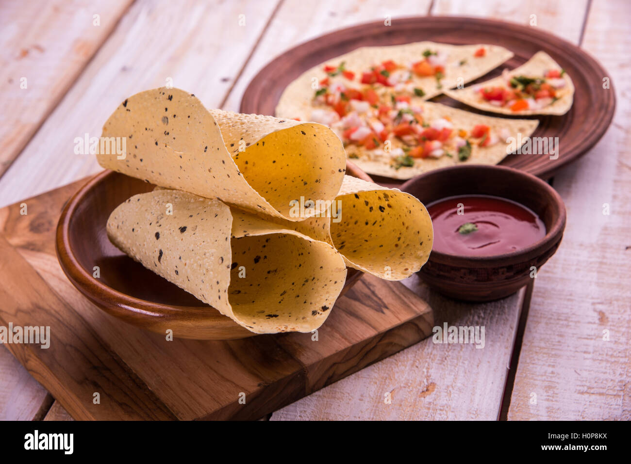 masala papad or roll papad indian vegetarian crispy food or starter ...