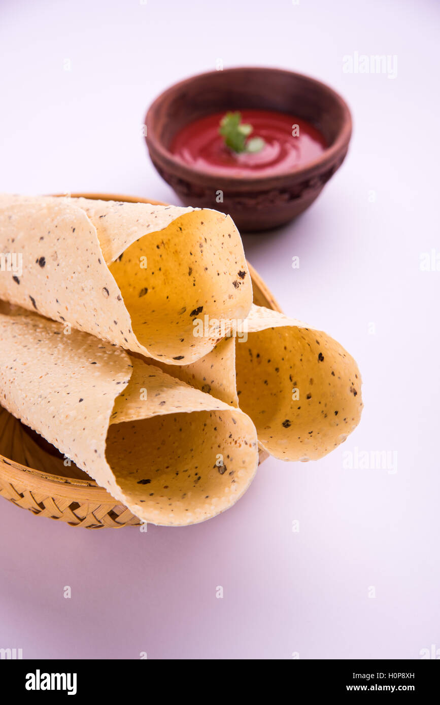 masala papad or roll papad indian vegetarian crispy food or starter ...