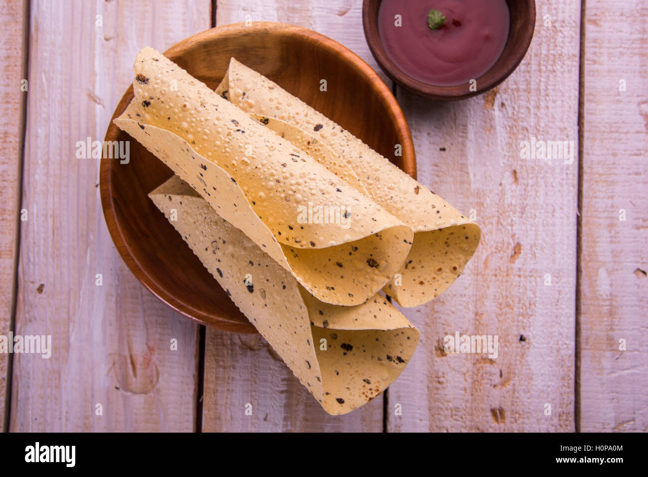 masala papad or roll papad indian vegetarian crispy food or starter ...