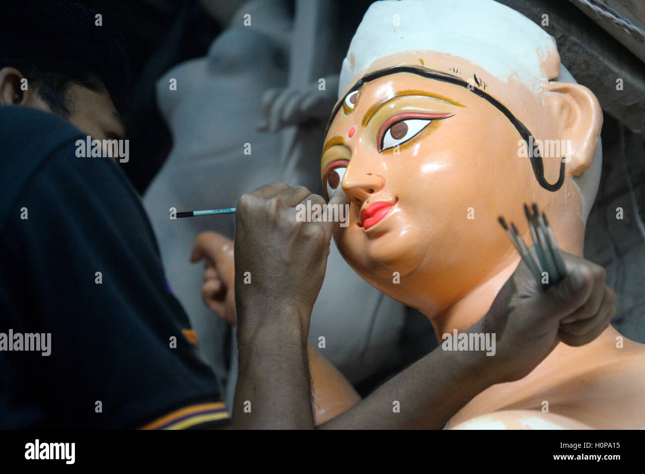 Kolkata, India. 21st Sep, 2016. Artisan draw Durga idols eyes ahead of ...