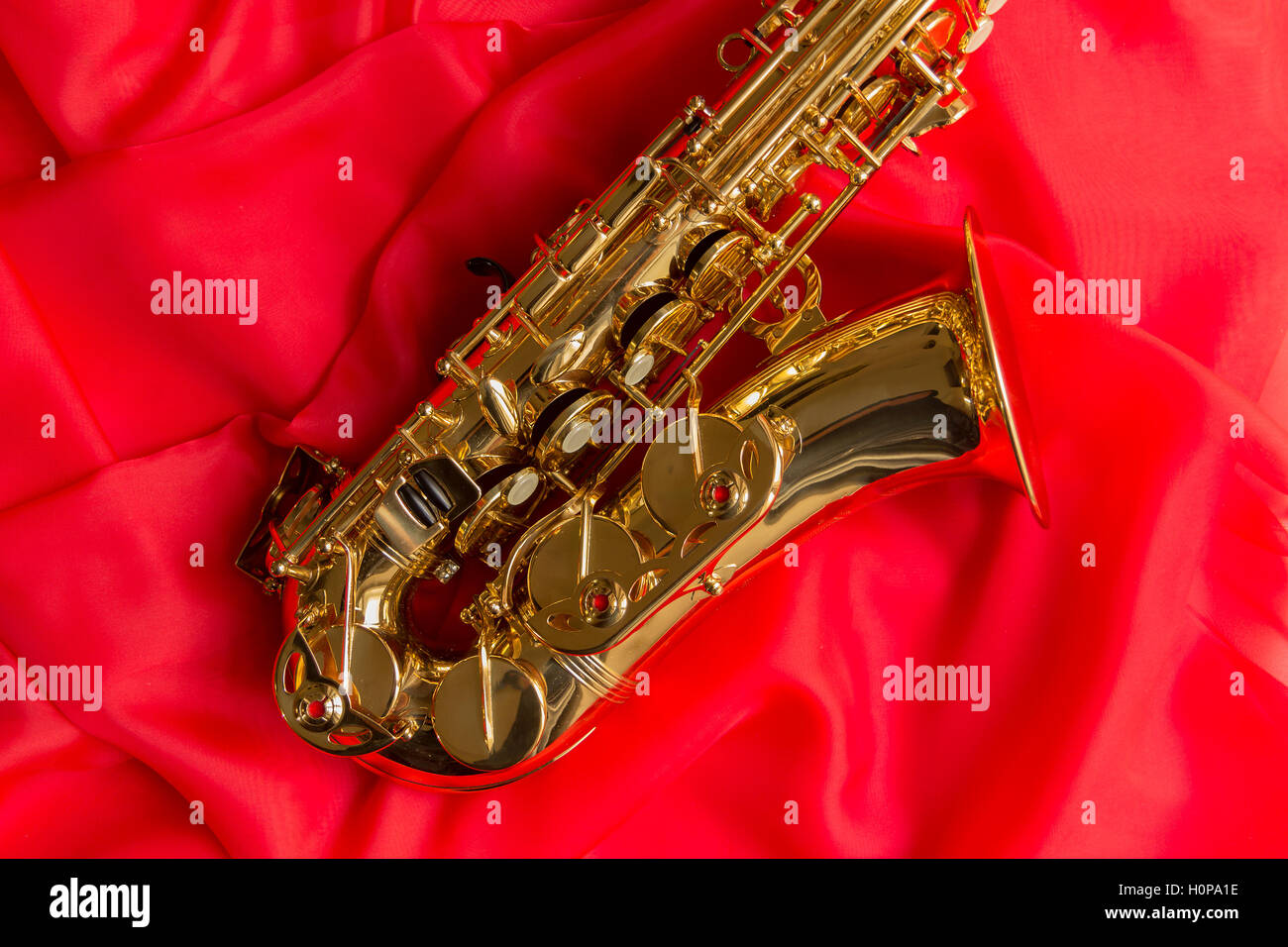 Saxophone on red silk hi-res stock photography and images - Alamy