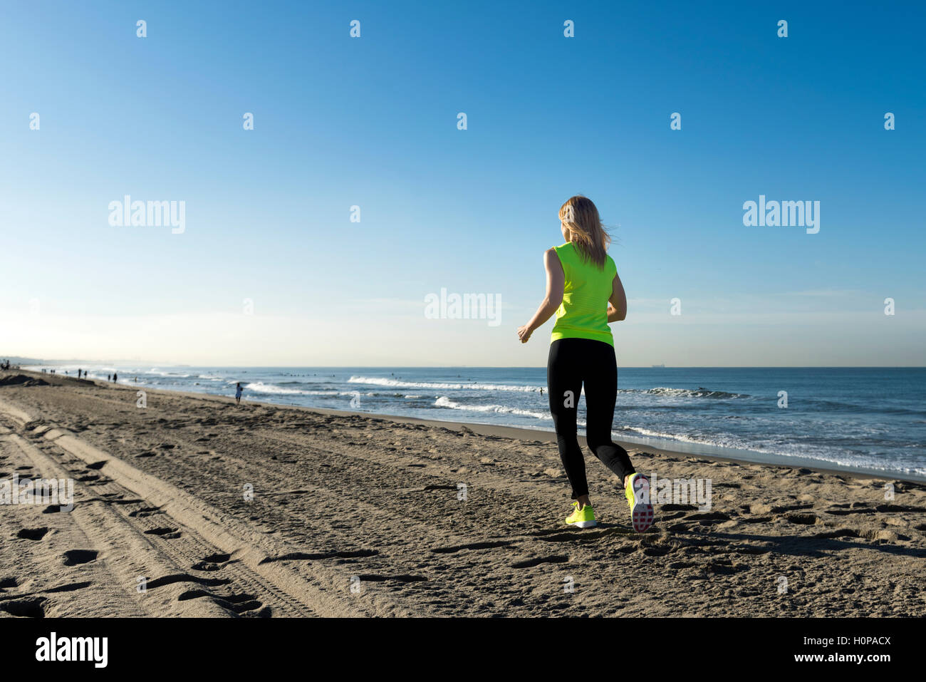 Jogger at santa monica beach hi-res stock photography and images - Alamy