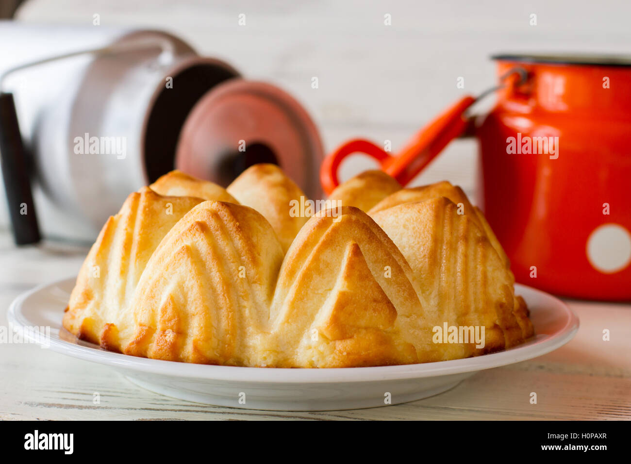 Dessert and opened milk cans Stock Photo - Alamy