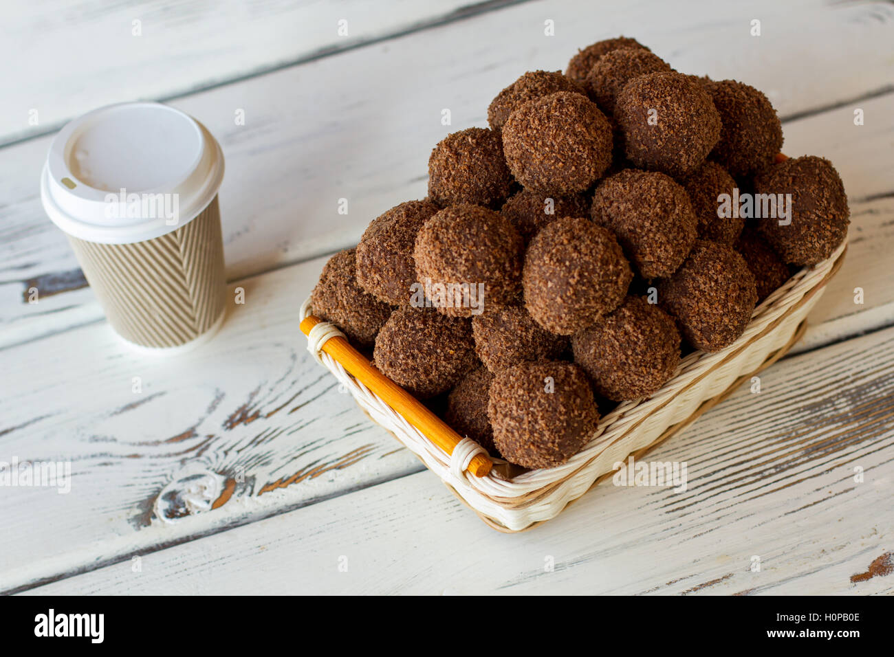 Sweets in wicker basket Stock Photo - Alamy