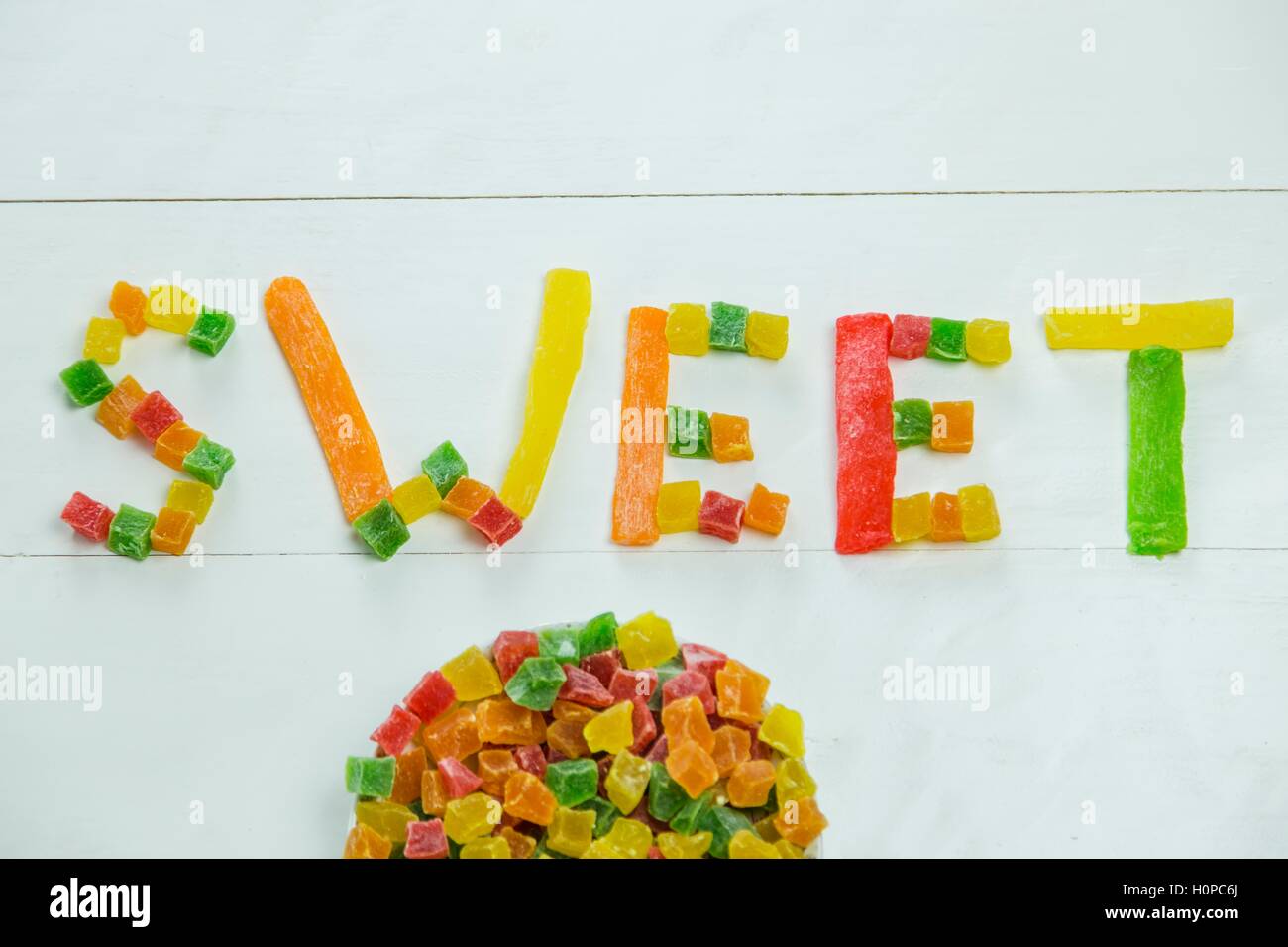 Sweet word with candied fruits Stock Photo - Alamy