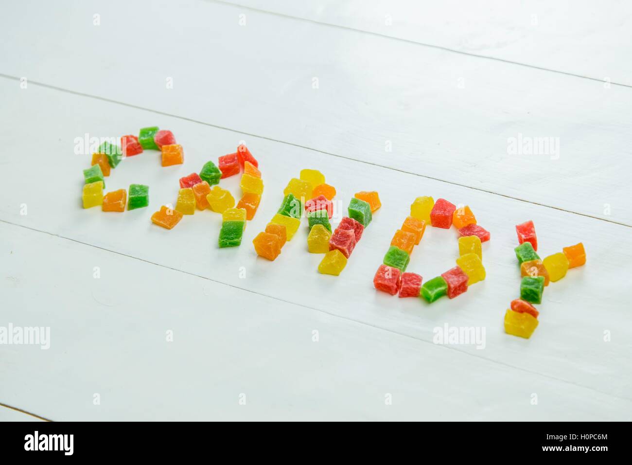 Word candy written with dried pineapples Stock Photo - Alamy