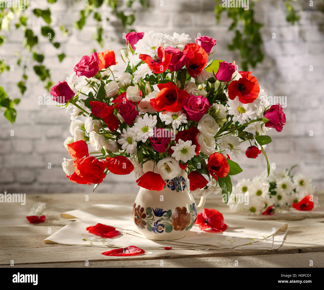 Bouquet of flowers including poppies, roses Stock Photo - Alamy