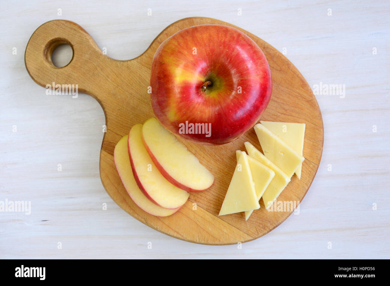 Beautiful honeycrisp apple on unique apple shaped cutting board on ...