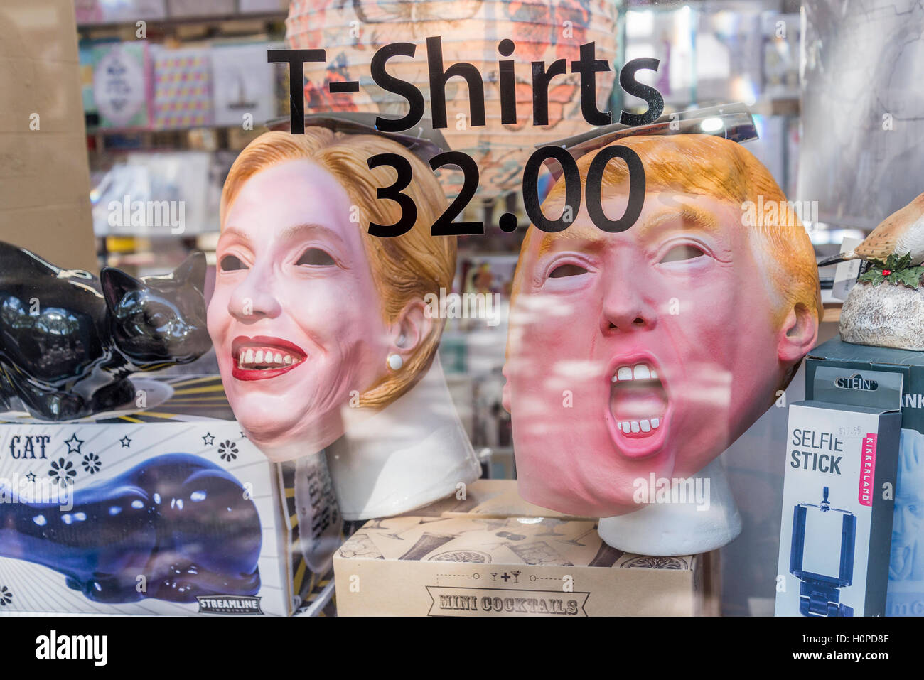 Donald Trump and Hilary Clinton masks in store window Stock Photo - Alamy