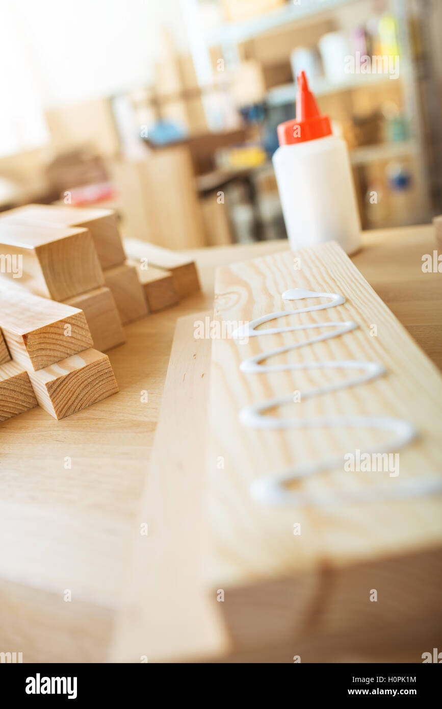 Gluing wooden board. DIY concept Stock Photo - Alamy
