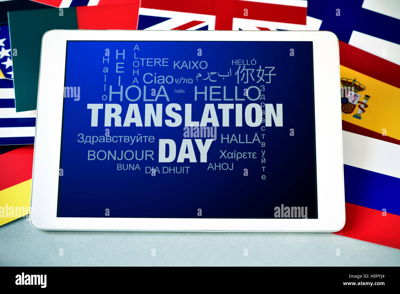 the text Translation Day in the screen of a tablet computer, and the ...