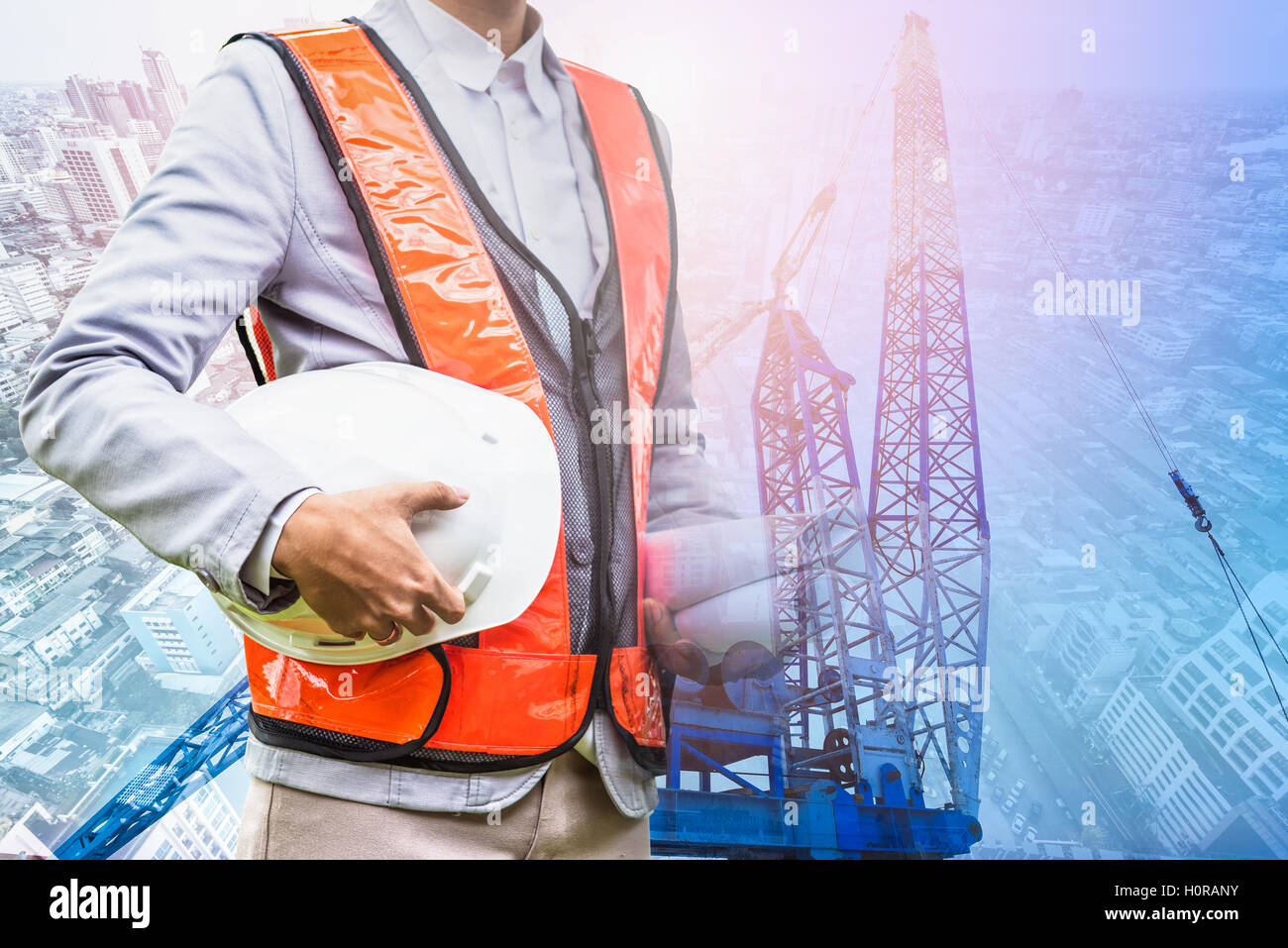 Double exposure civil engineer person and the mobile crane machine with ...