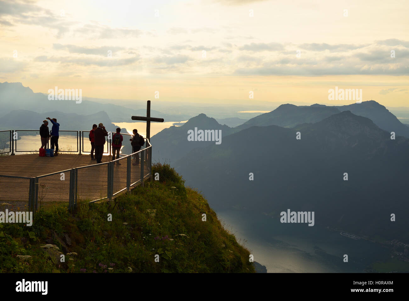 Tourists on the Stoos-Fronalpstock observation deck, view of Rigi and ...