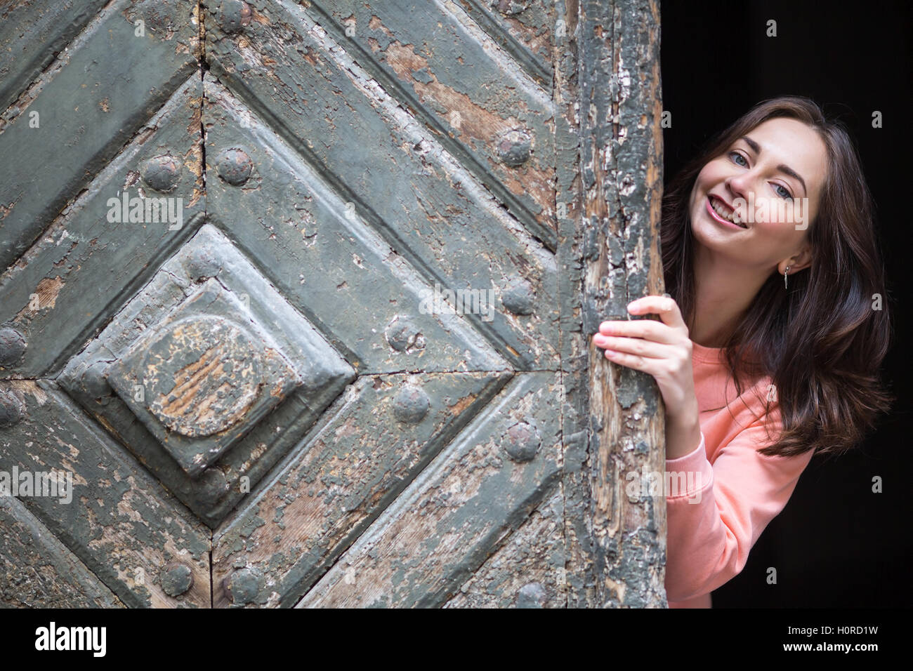 Girl by wooden gate hi-res stock photography and images - Alamy