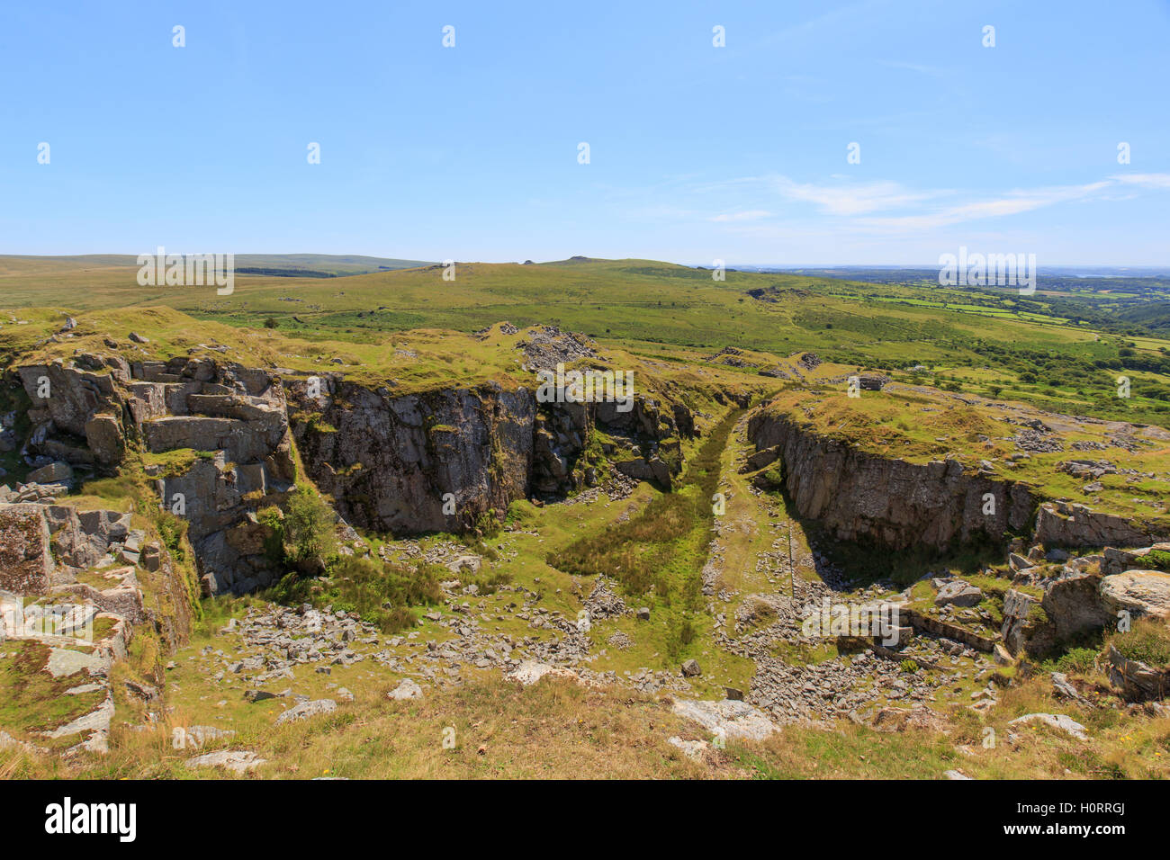 Swelltor Quarry on Dartmoor with Plymouth Sound in the distance and the ...