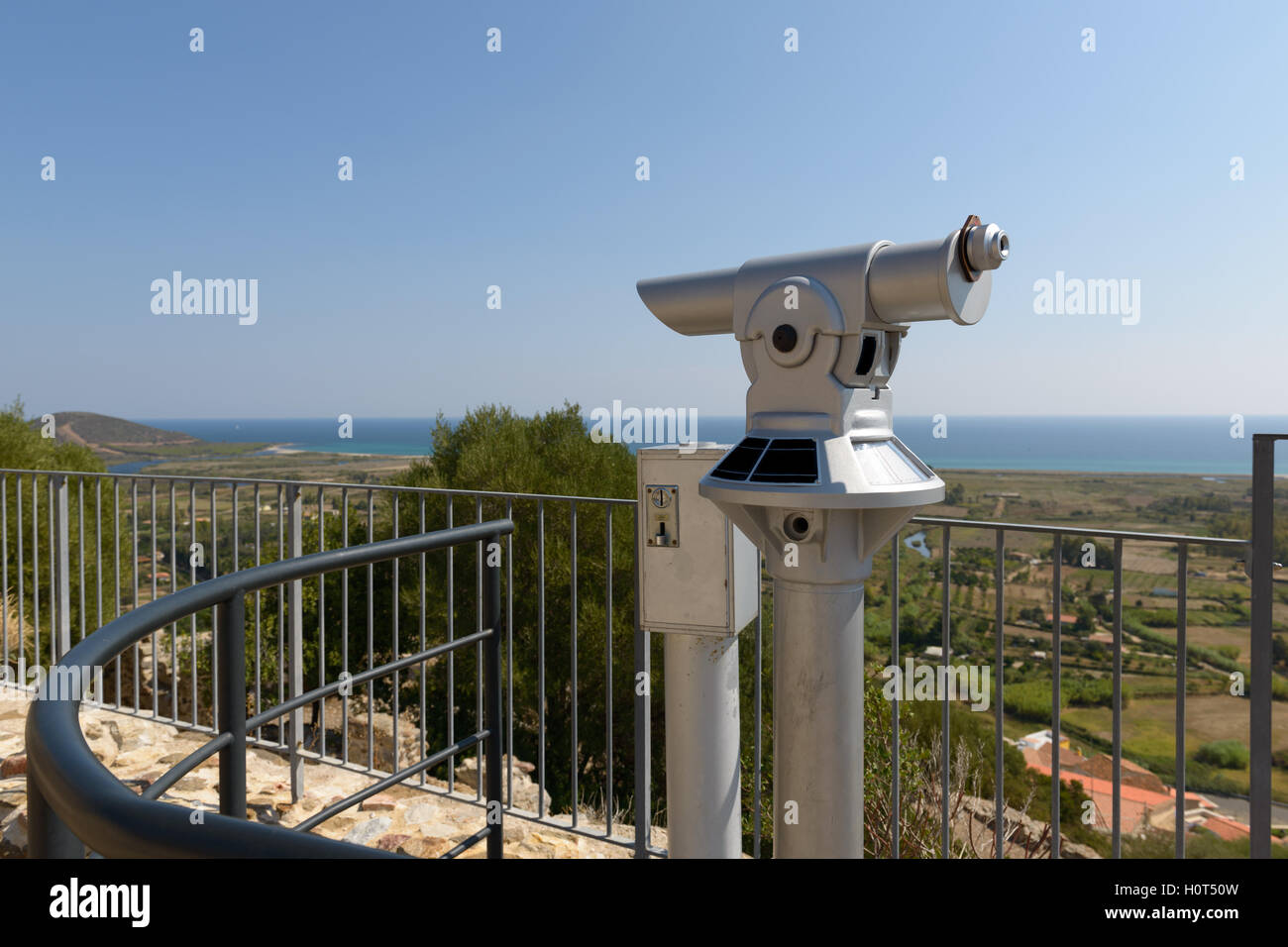 Telescope for panoramic views, token for tourist use Stock Photo - Alamy
