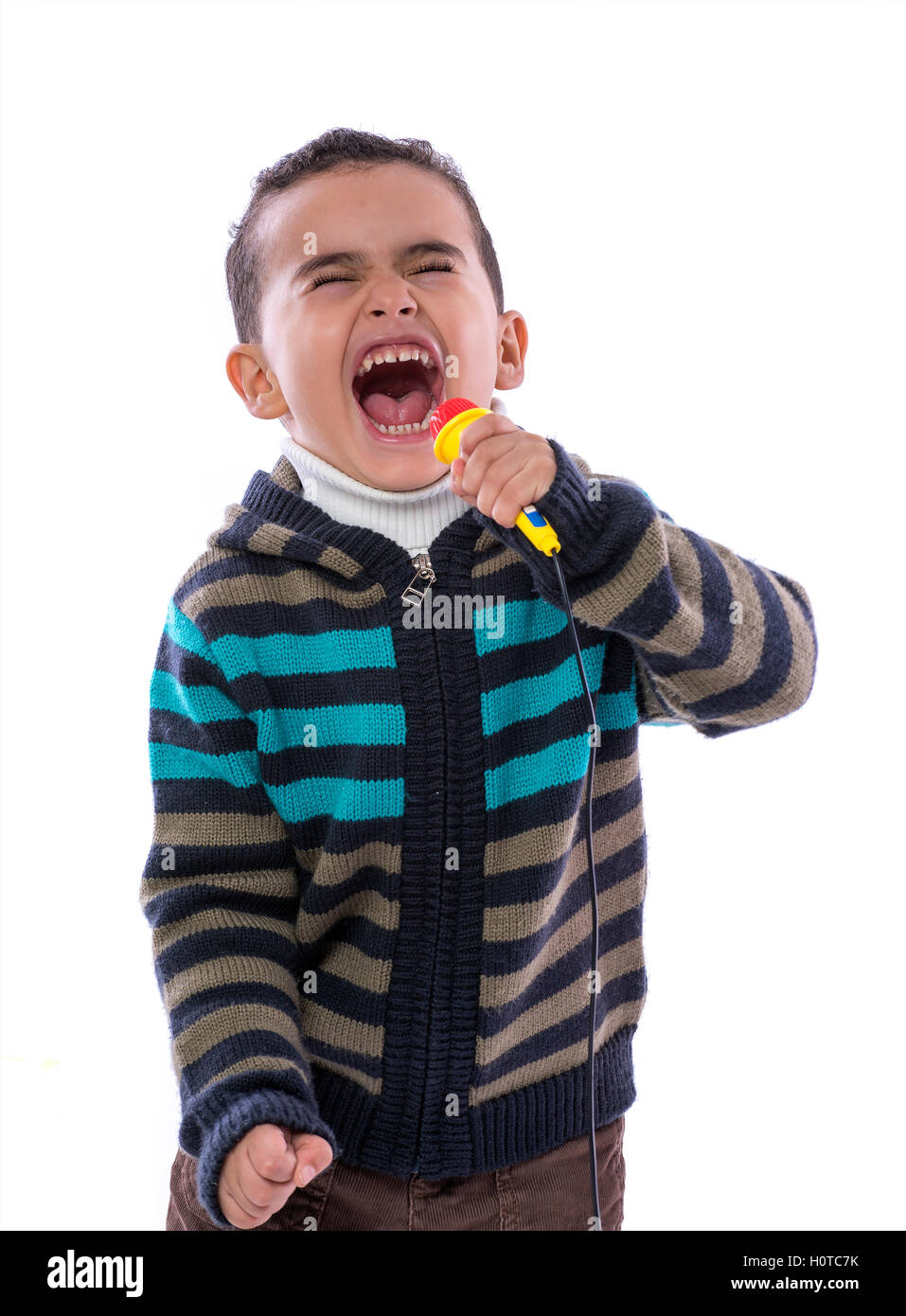 Boy with toy microphone hi-res stock photography and images - Alamy