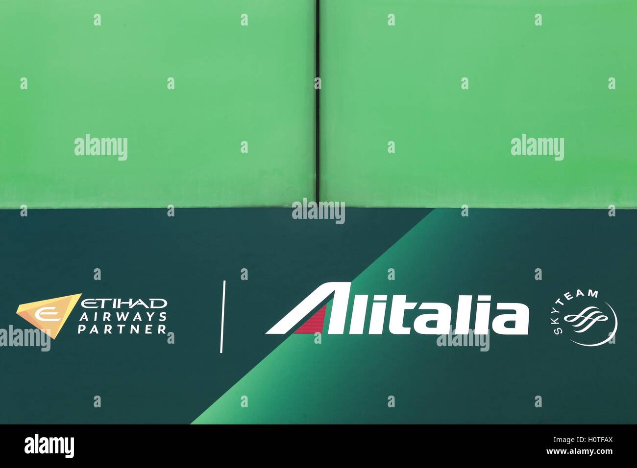 Alitalia logo on a wall. Alitalia is the flag carrier of Italy. The ...
