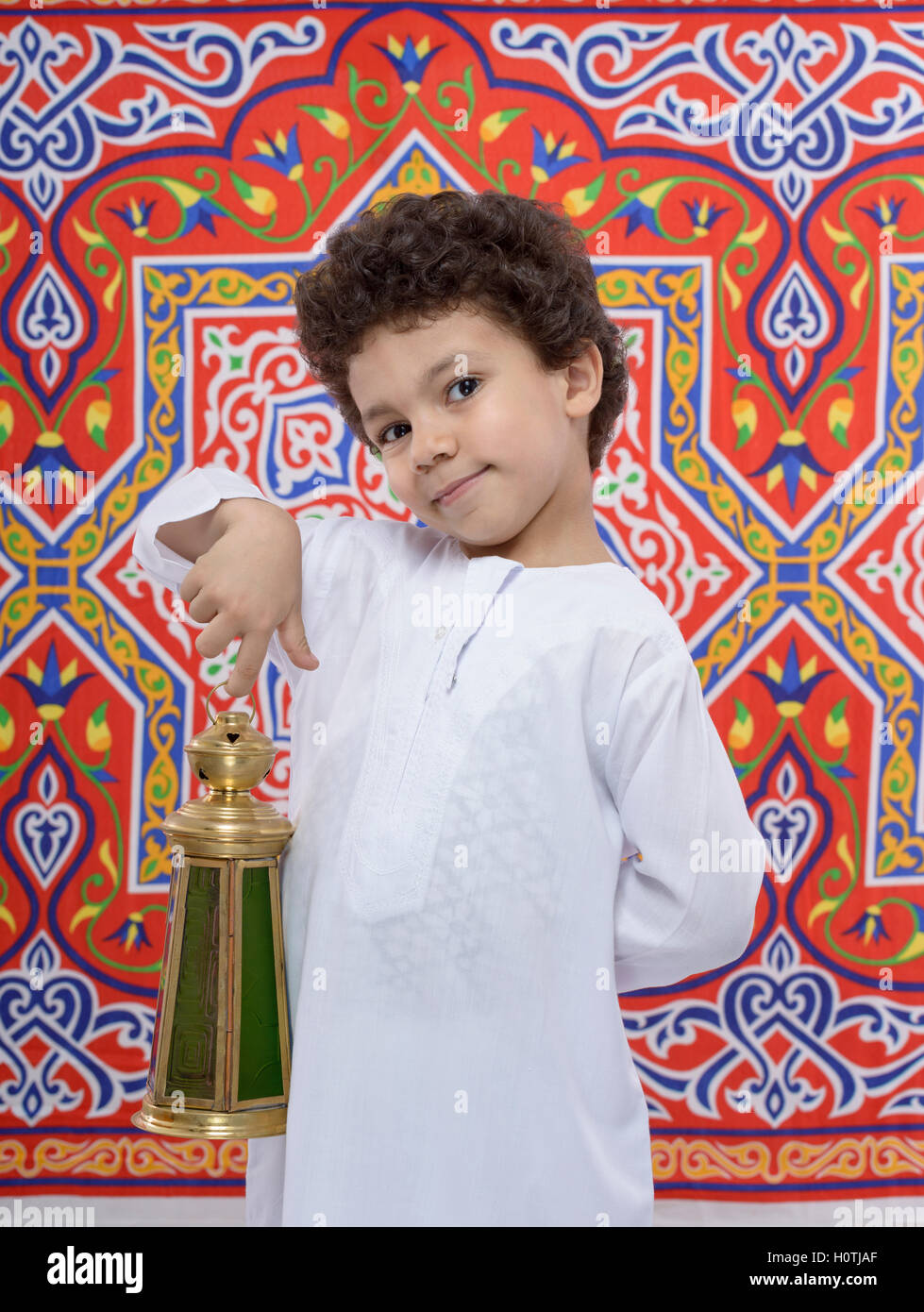 Happy Arabian Smiling Boy with Lantern Celebrating Ramadan Stock Photo ...