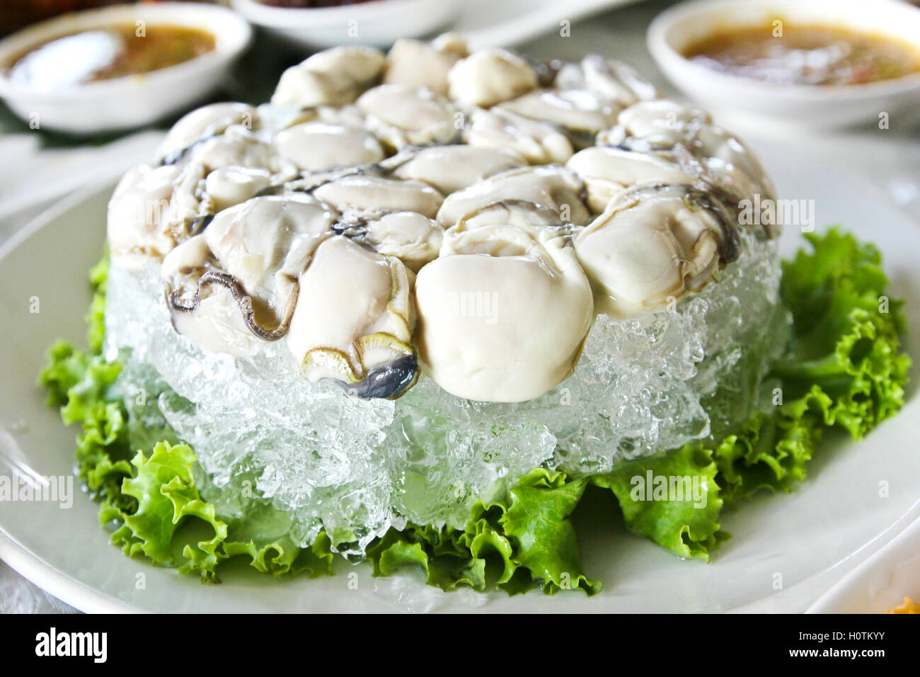 Fresh raw oyster hi-res stock photography and images - Alamy