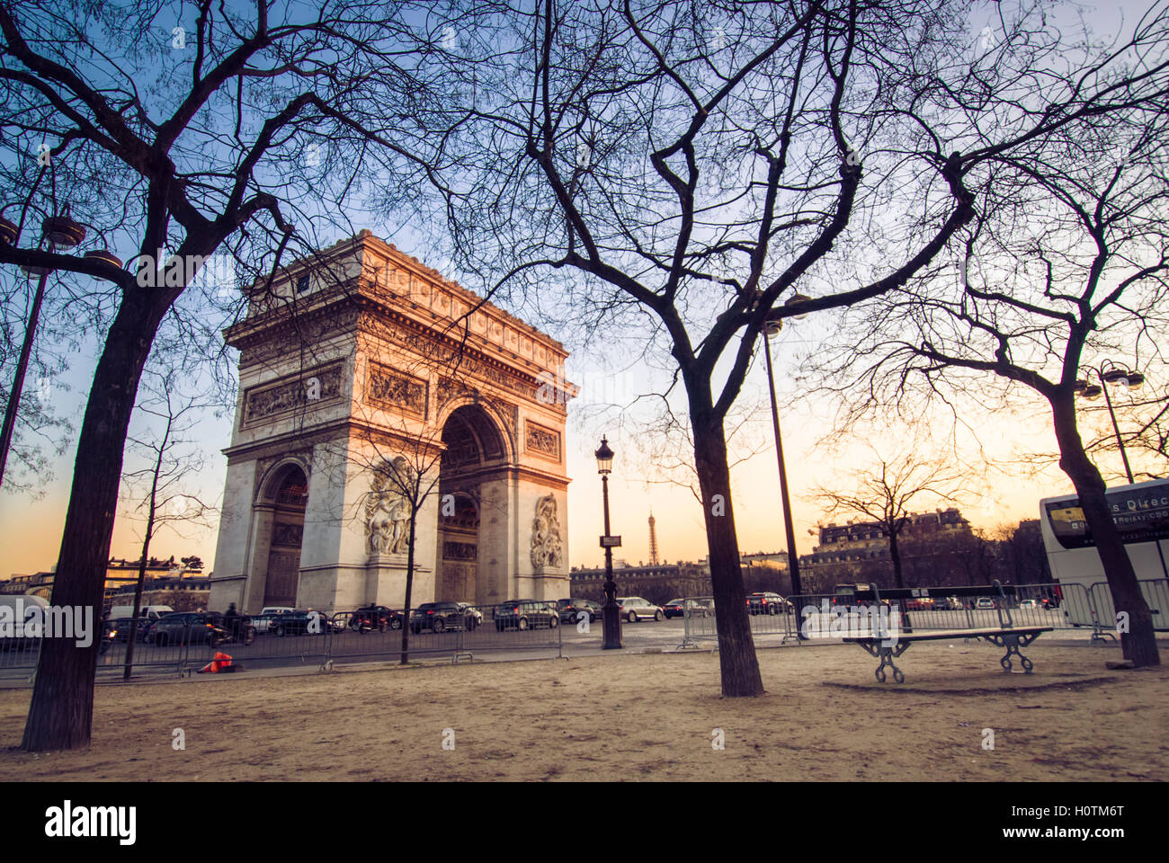 Triumphal Arch in Paris, France in dusk. Toned with soft retro style ...