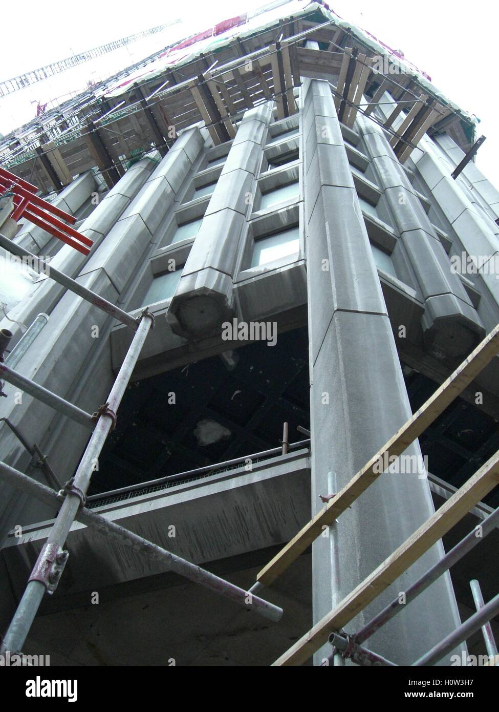 Looking up through a scaffolding to a building being built. Throgmorton ...