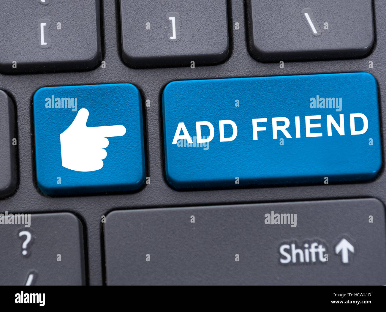 Close-up view of add friend button on laptop keypad as virtual ...