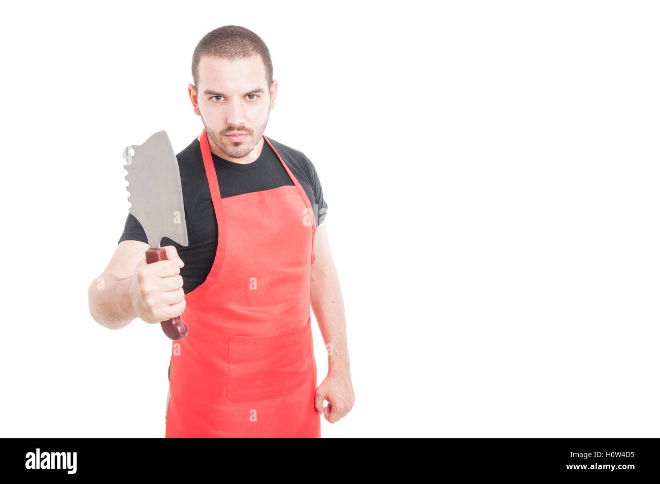 Male butcher cutting meat on Cut Out Stock Images & Pictures - Alamy