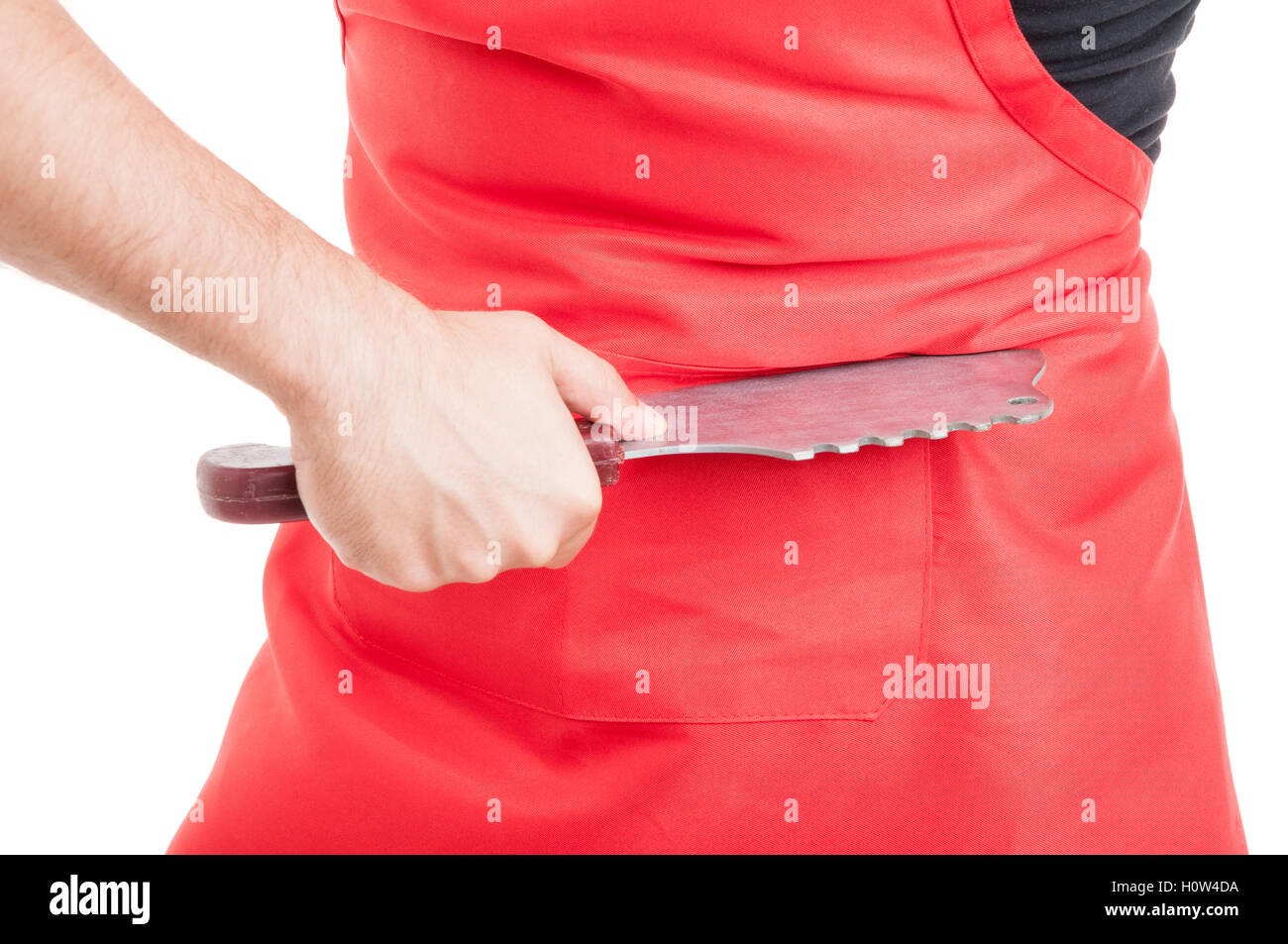 Closeup of butcher hand stabbing tummy with sharp knife isolated on ...