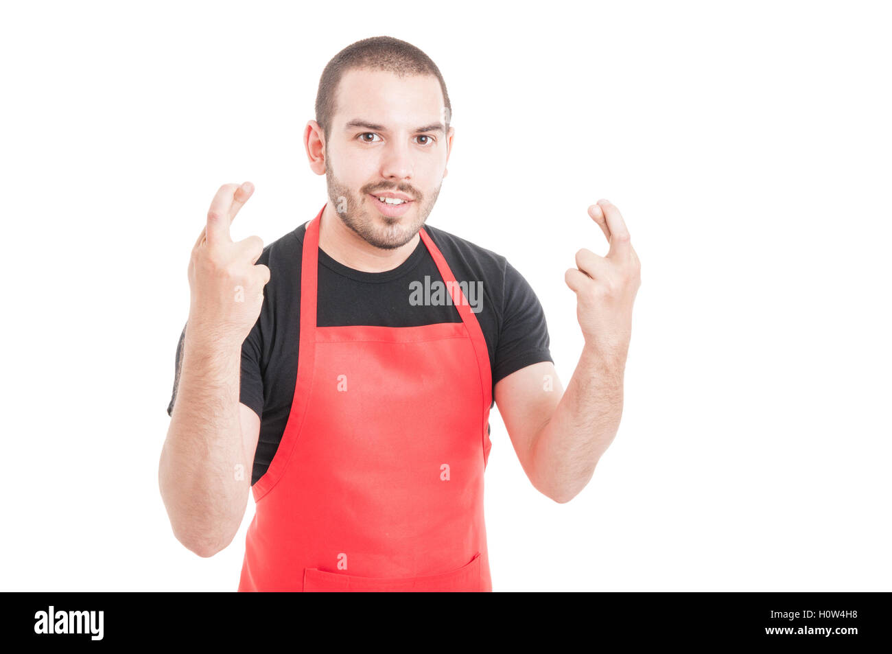 Smiling handsome employee doing double luck sign with both hands ...