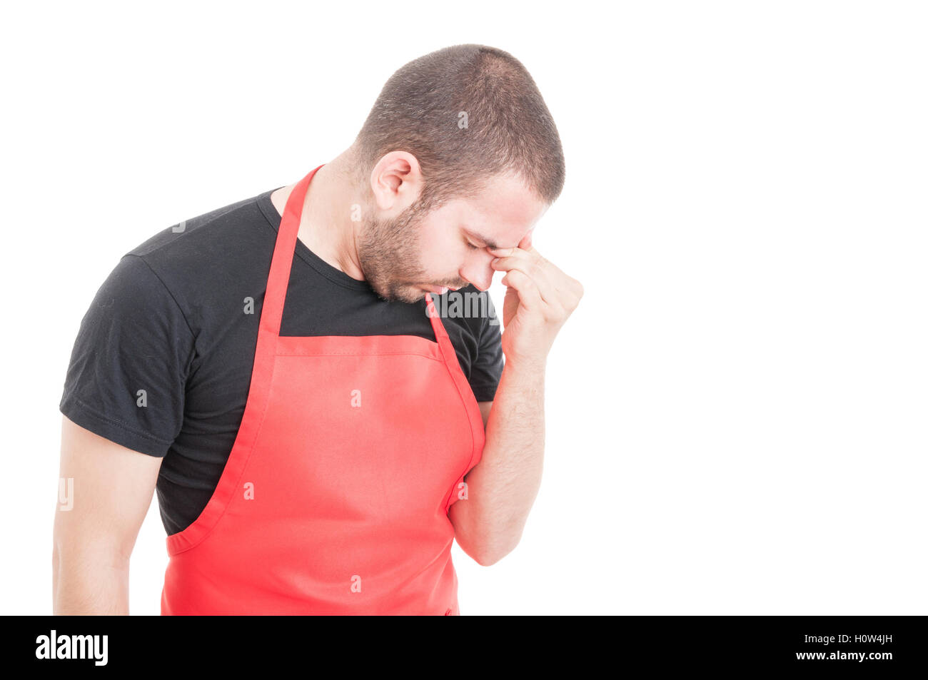 Stressed market seller looking upset and worried isolated on white ...