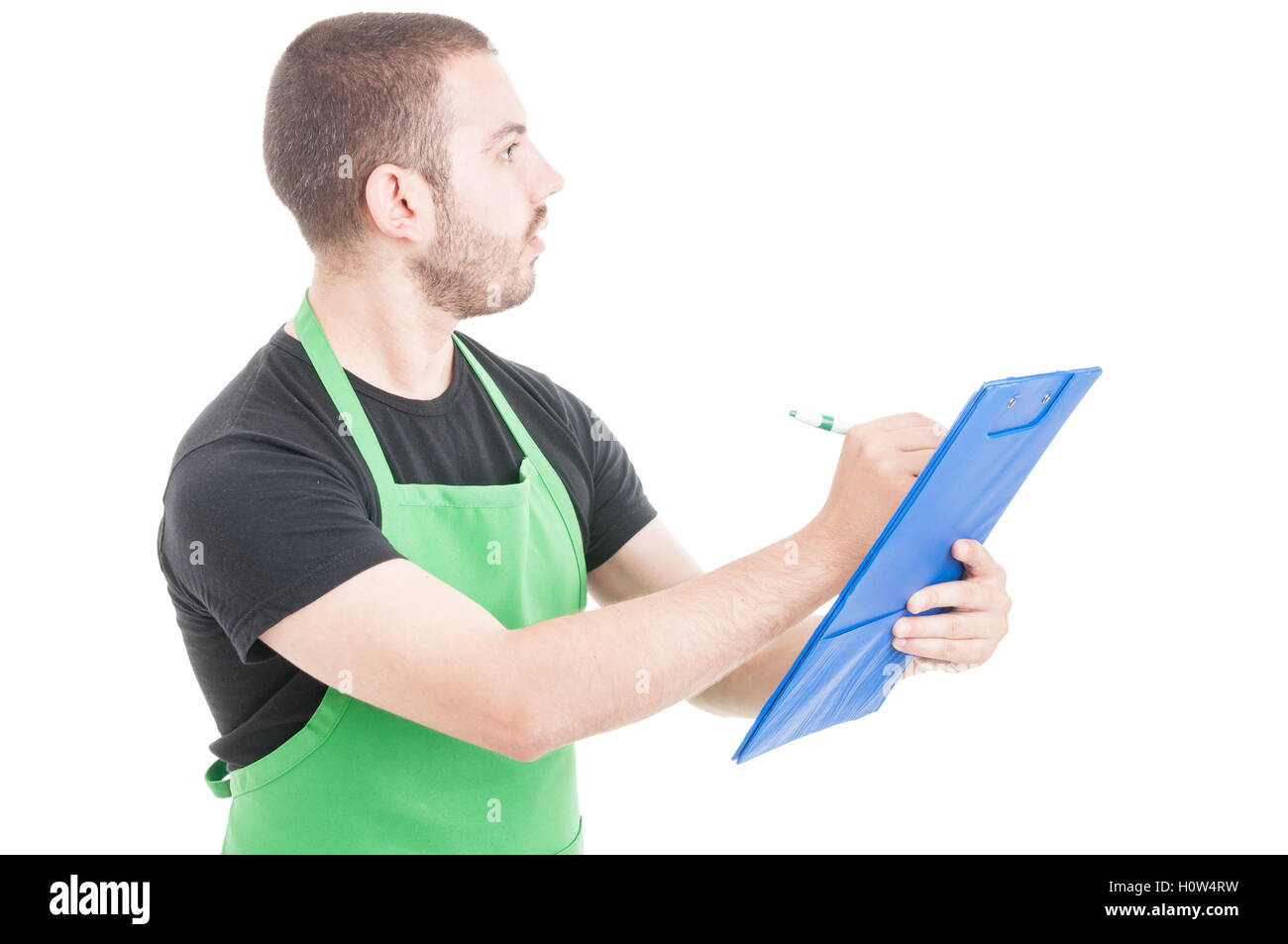 Young supermarket employee showing and writing on clipboard isolated on ...