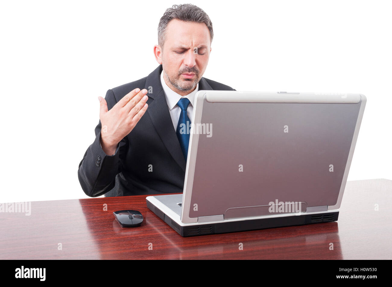 Stressed businessman sweating in his office acting nervous isolated on ...
