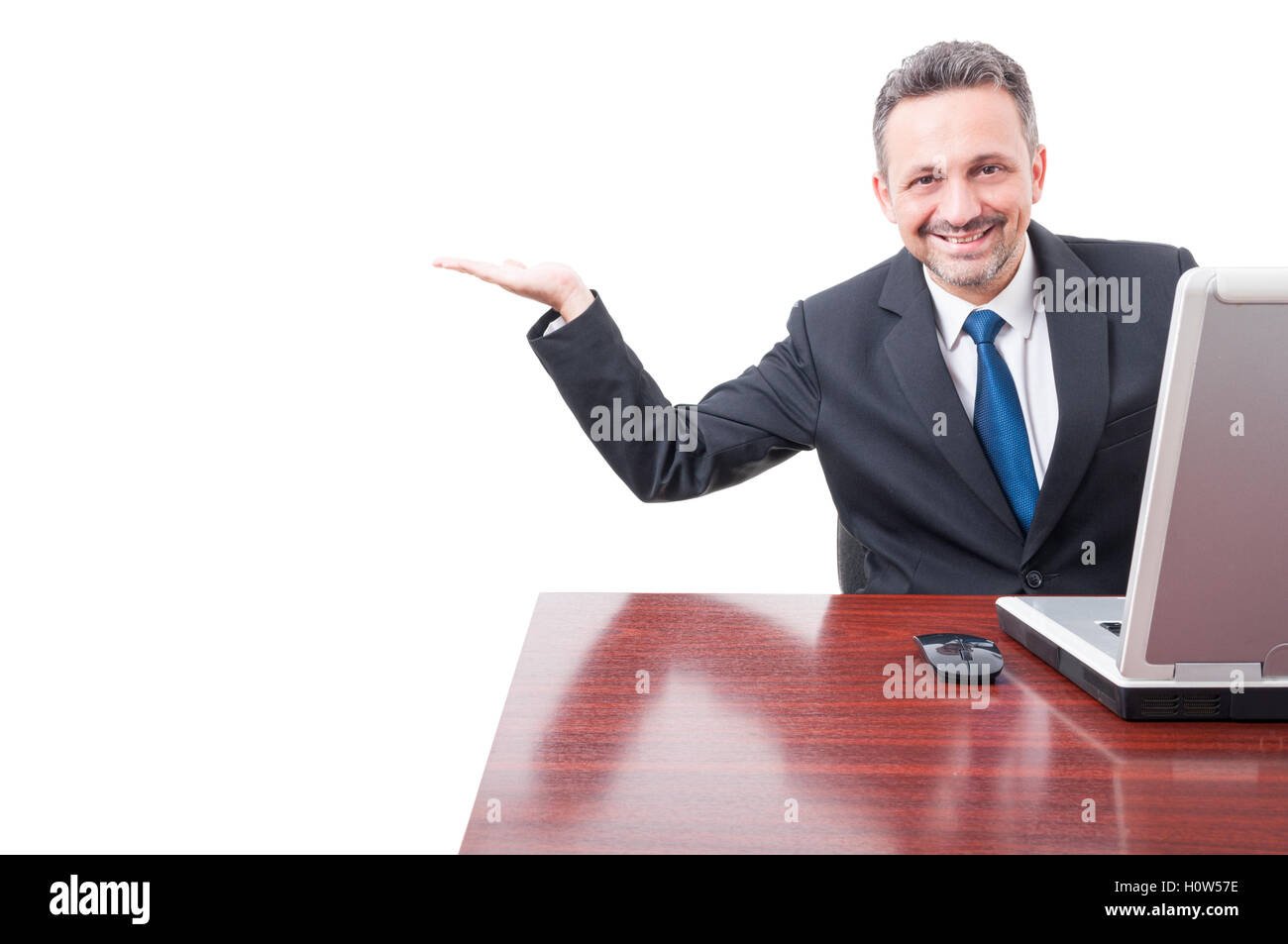 Happy smiling manager showing something in his palm or blank copyspace ...