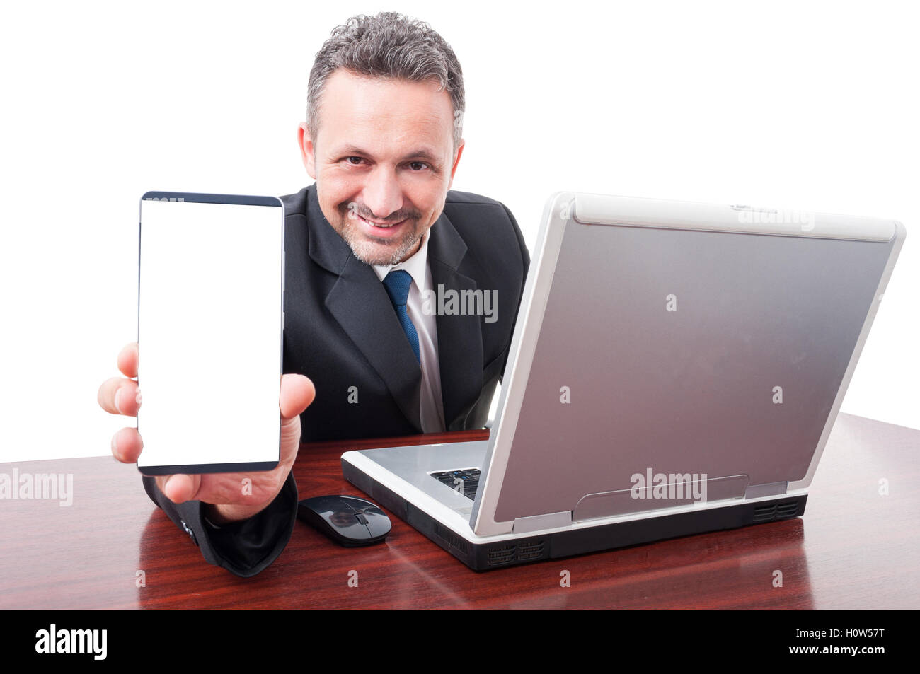 Successful and smiling manager showing smartphone with blank screen and ...
