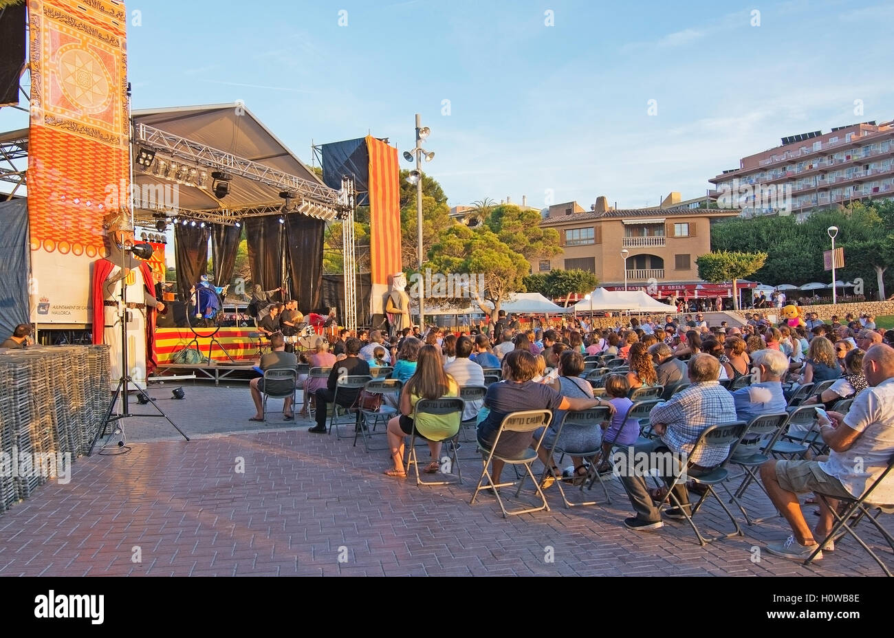 Fiesta play performance Moors and Christians and audience on a sunny ...