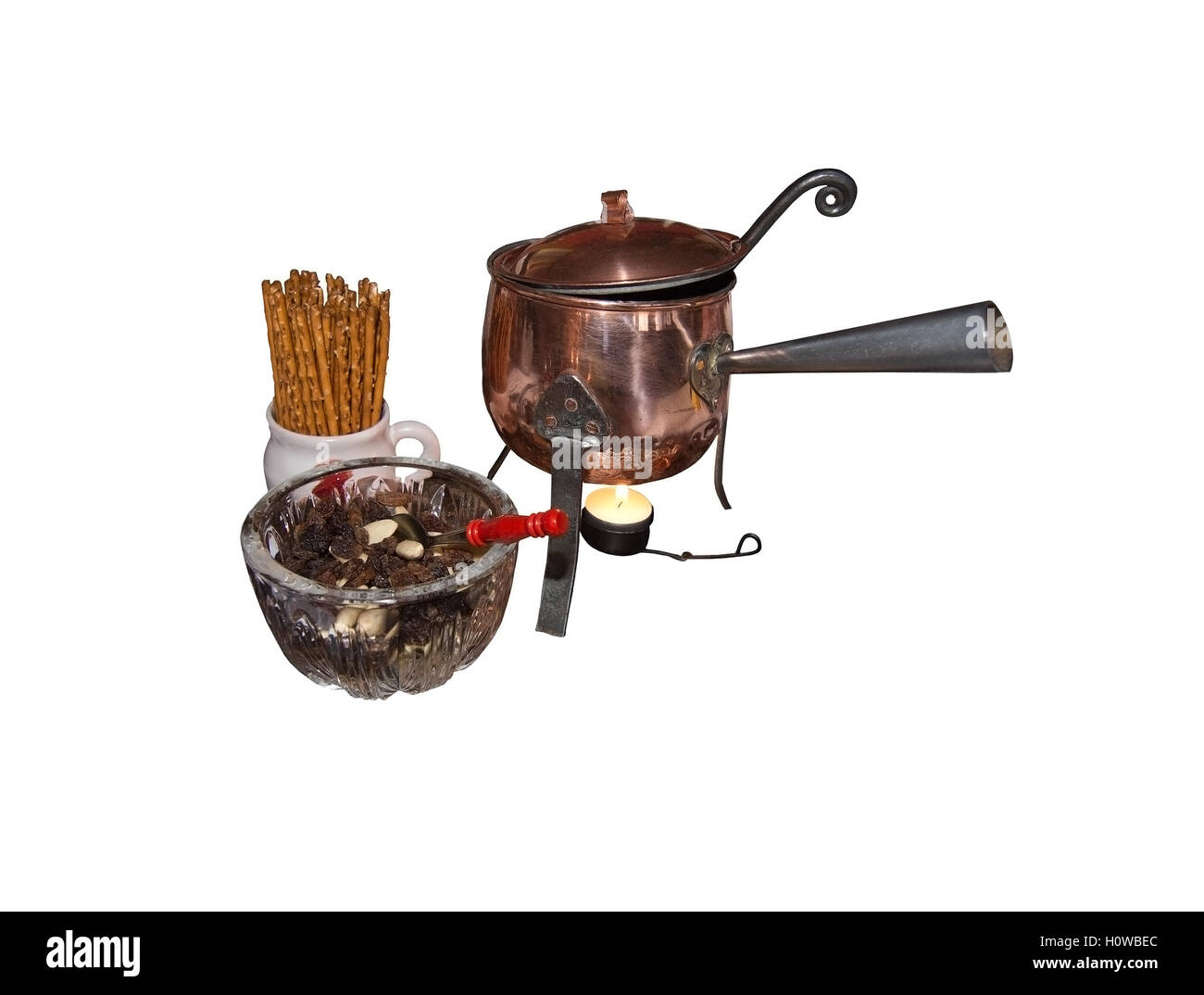 Christmas goodies glogg gluhwine in copper pot isolated on white Stock ...
