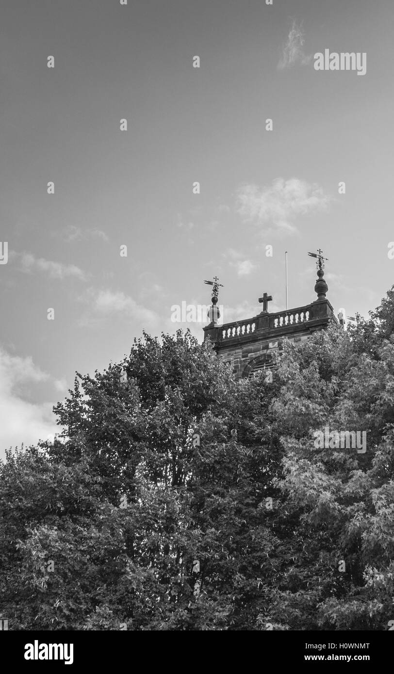Black and white photograph showing the spire of Saint Modwen's Church ...