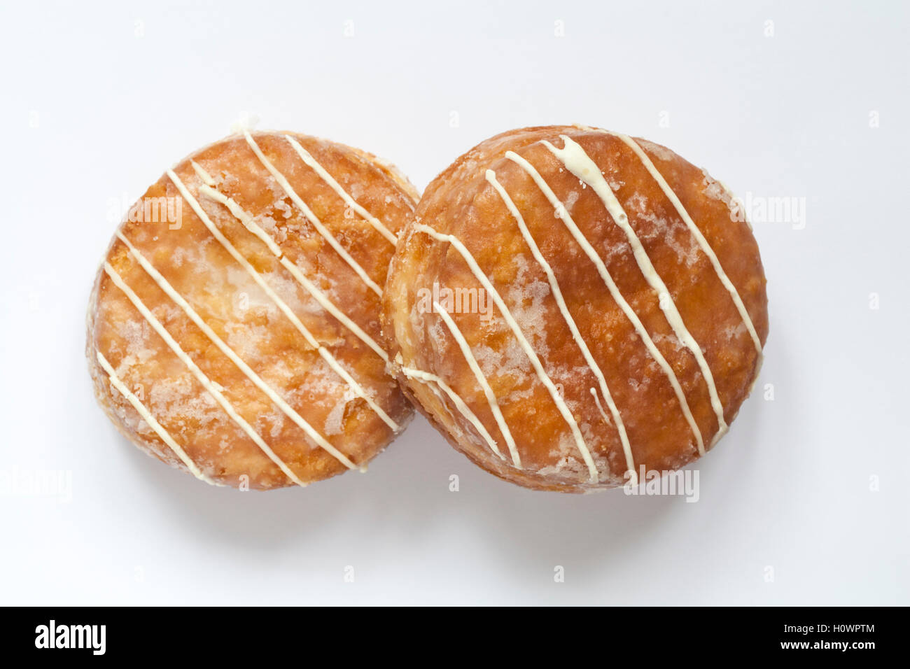 M&S Passion Fruit Yum Yums iced doughnuts isolated on white background ...