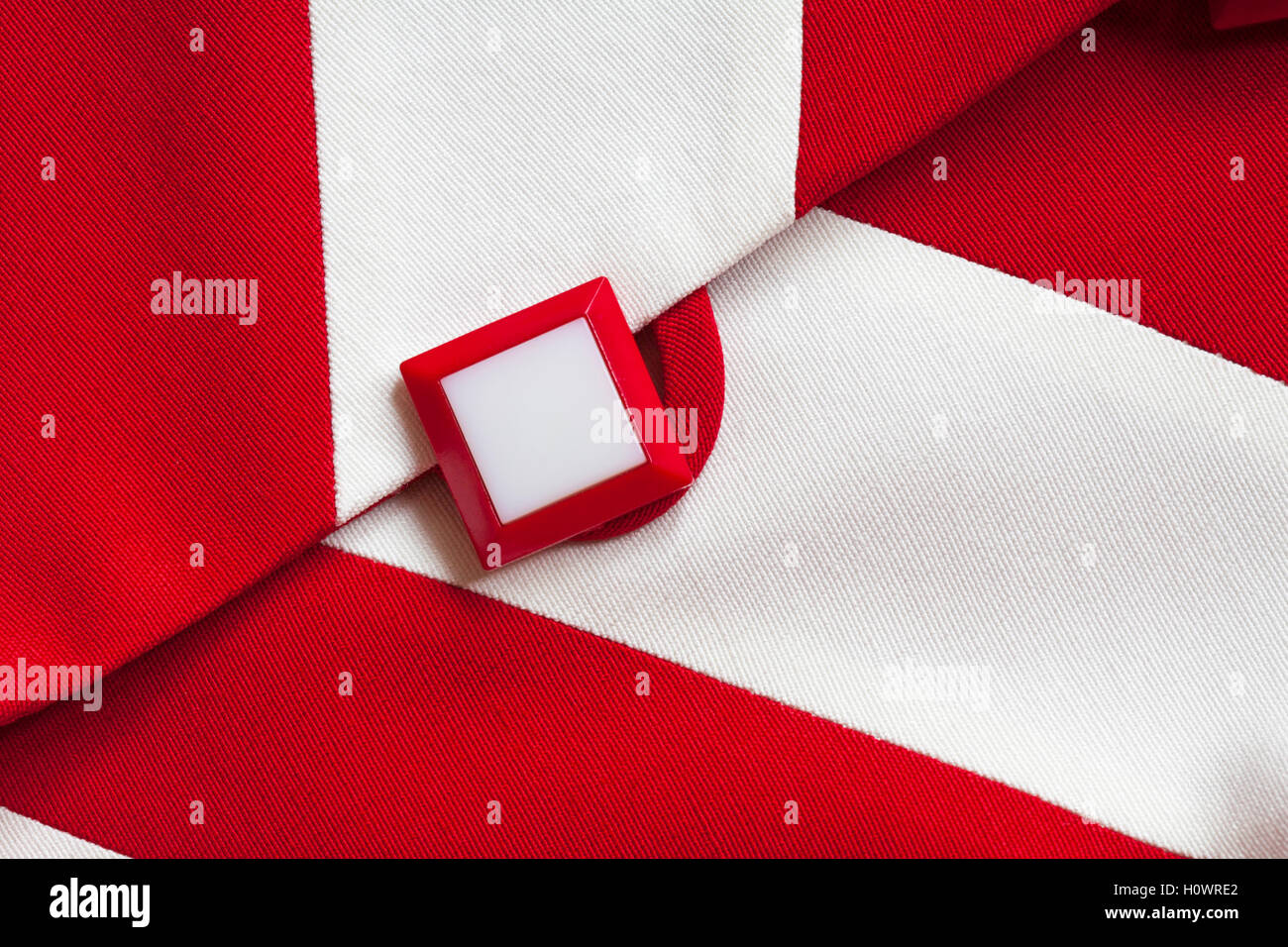 diamond square shape red and white button on lady's red and white ...