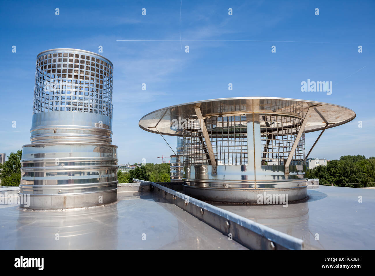 on an building there is an ventilation on the roof Stock Photo - Alamy